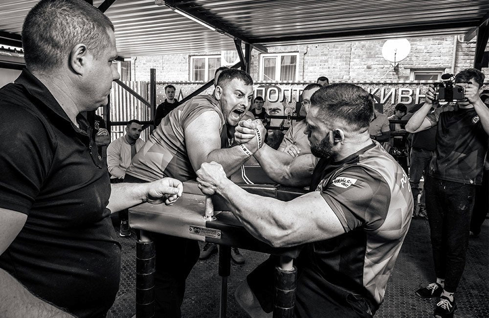 10 Killer Arm Wrestling Workouts To Beat Someone Hands Down